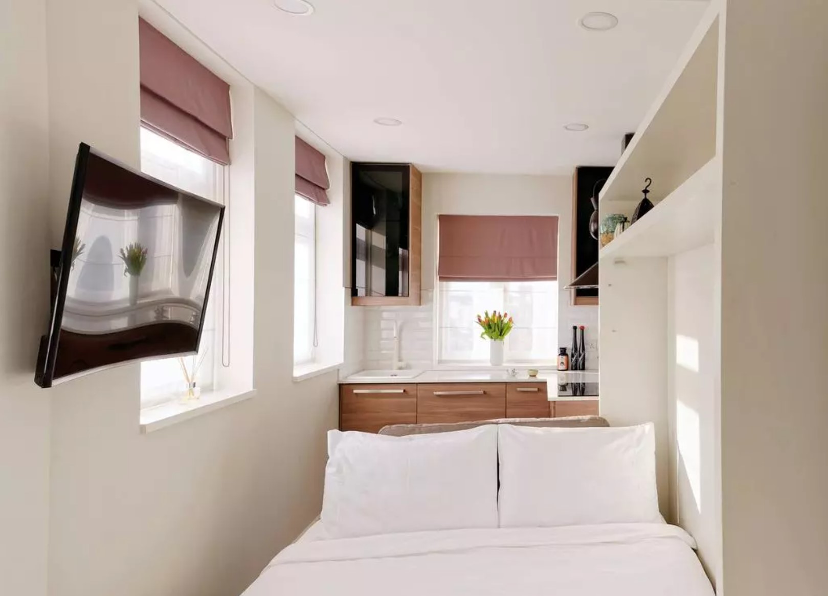 Cosy £1,712-per-month studio flat is so narrow tenants have to squeeze ...