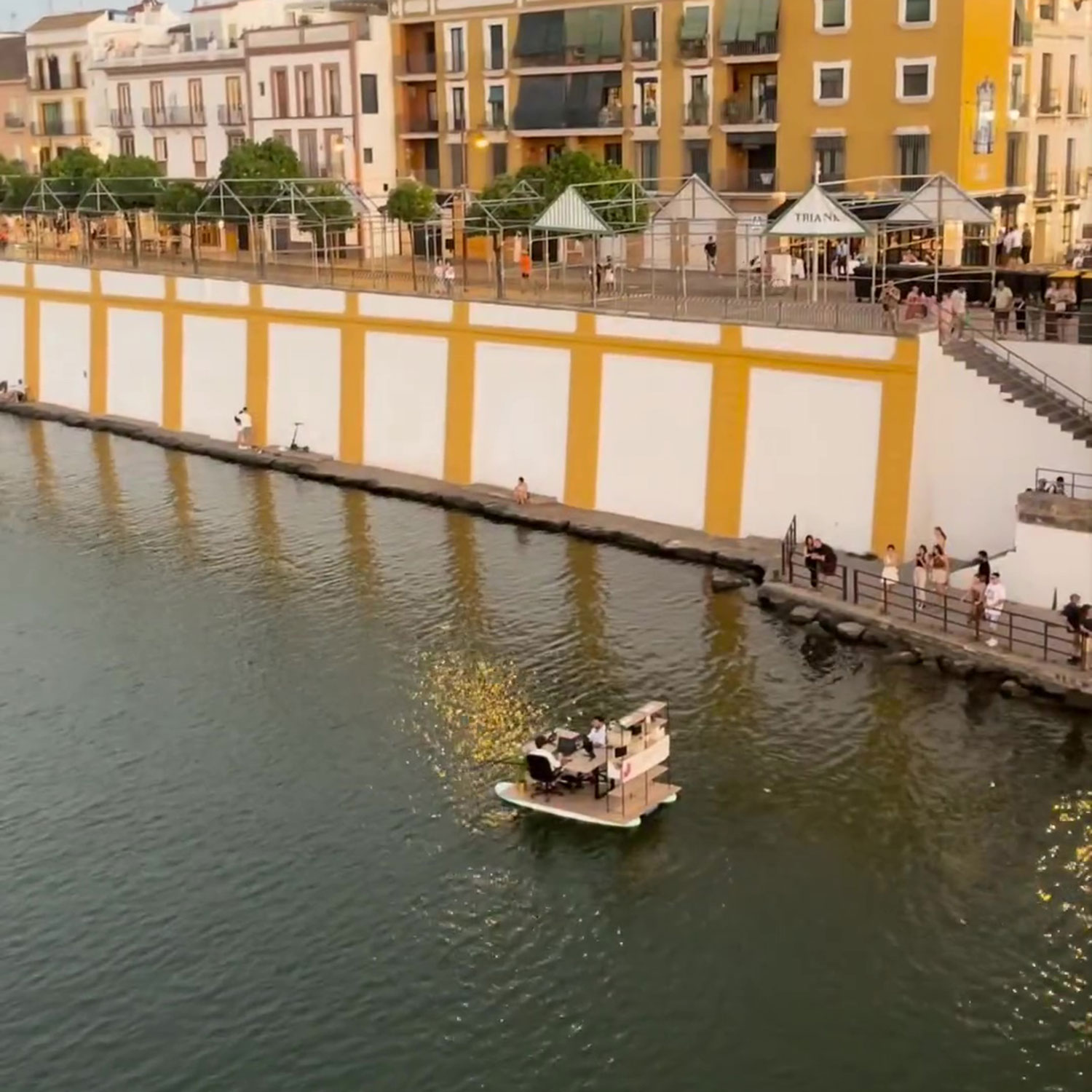 Lads cruise along river on floating office - What's The Jam