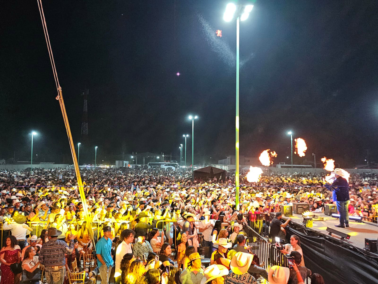 Dramatic moment singer saves fan set ablaze by pyrotechnics during ...
