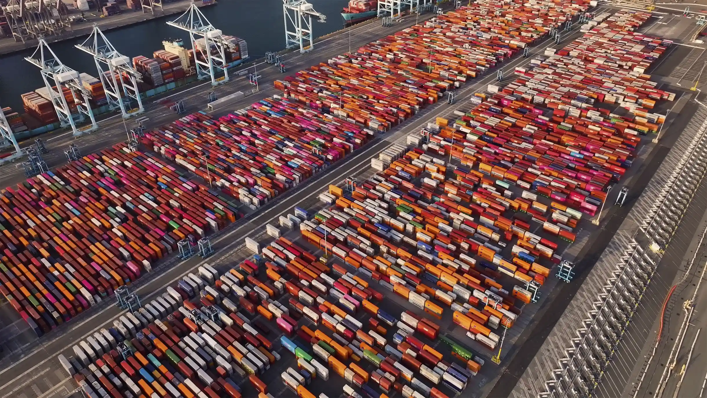 Colourful shipping containers look like Tetris game in stunning aerial ...