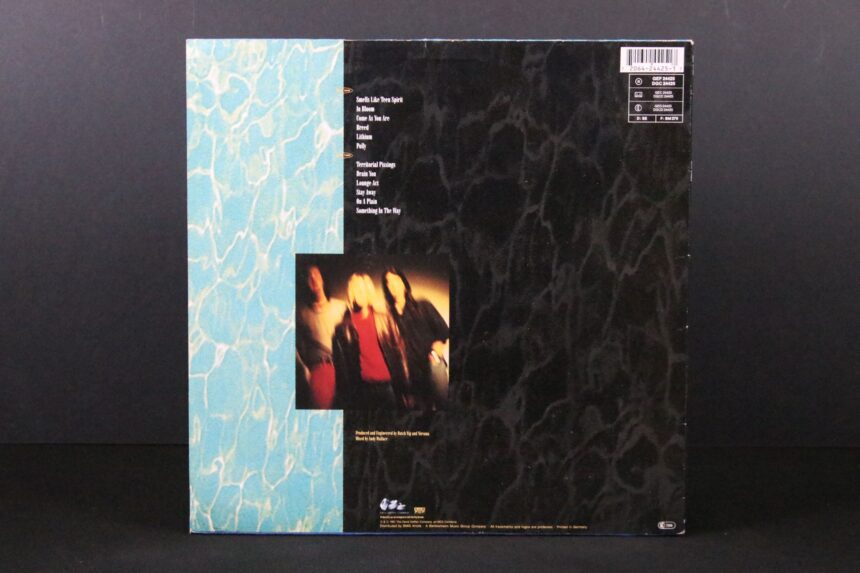 Signed Nirvana album Nevermind kept in loft for 30 years sells for over ...