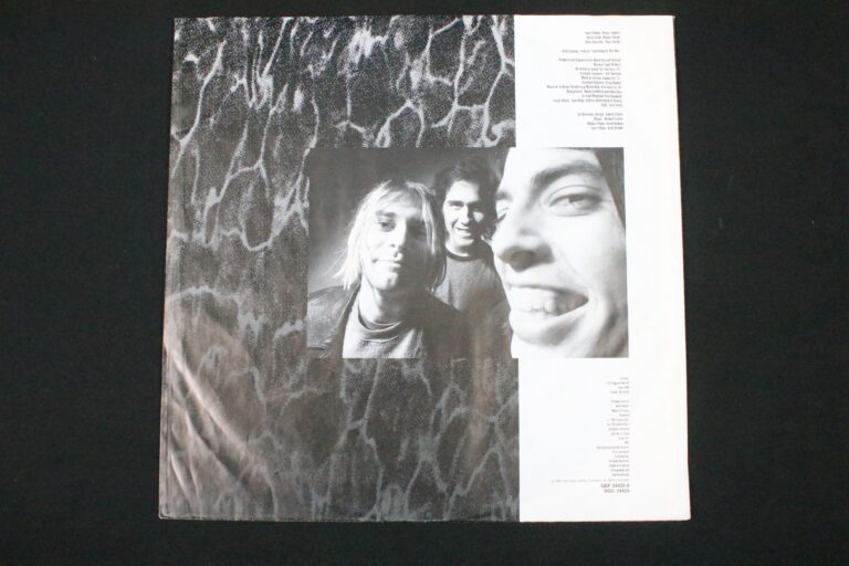 Signed Nirvana album Nevermind kept in loft for 30 years sells for over ...