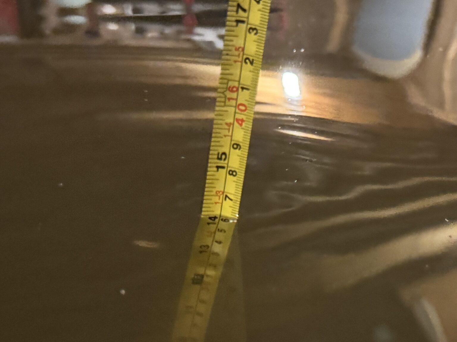 Mum SWIMS in flooded basement after devastating storm turns her home ...